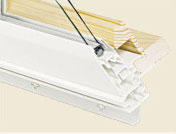 The multi-chambered vinyl-clad frame and sash improves structural ...