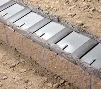 Single Wythe Cmu Flashing System Challenging Tradition: New Materials