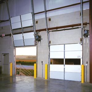 COMMERCIAL STEEL-RIBBED SECTIONAL DOORS
